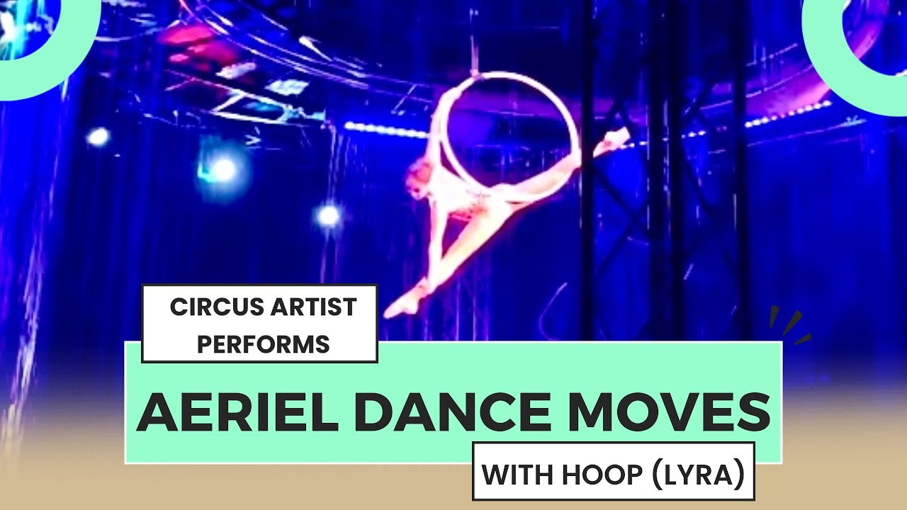 Circus artist performs aerial dance moves with hoop (Lyra). Артистка ...