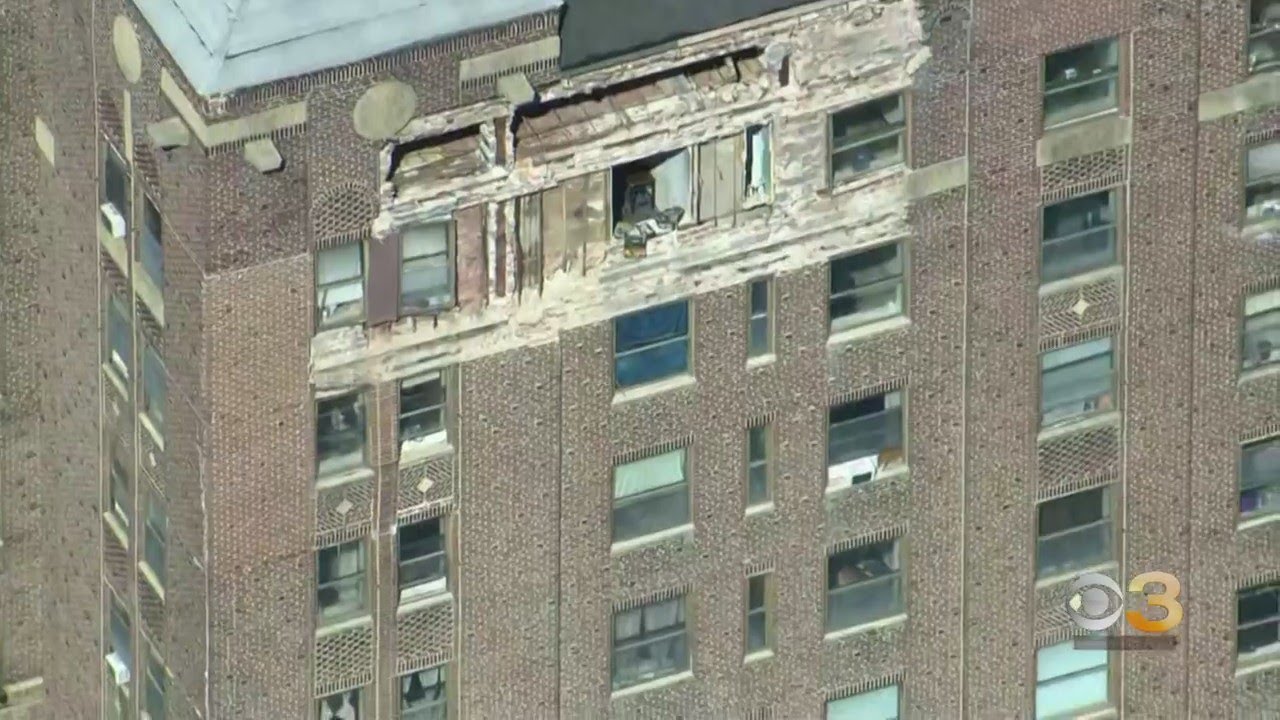 Residents displaced partial building collapse in Logan - YouTube