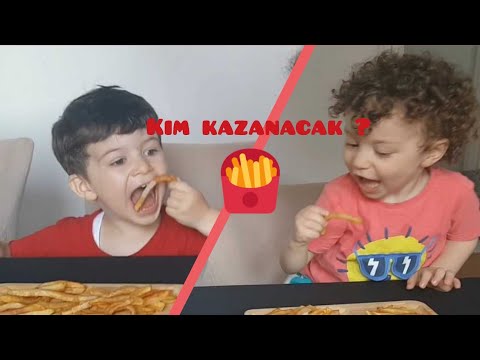 Cesur ve Çınar patates kızartması yeme yarışı yapıyor