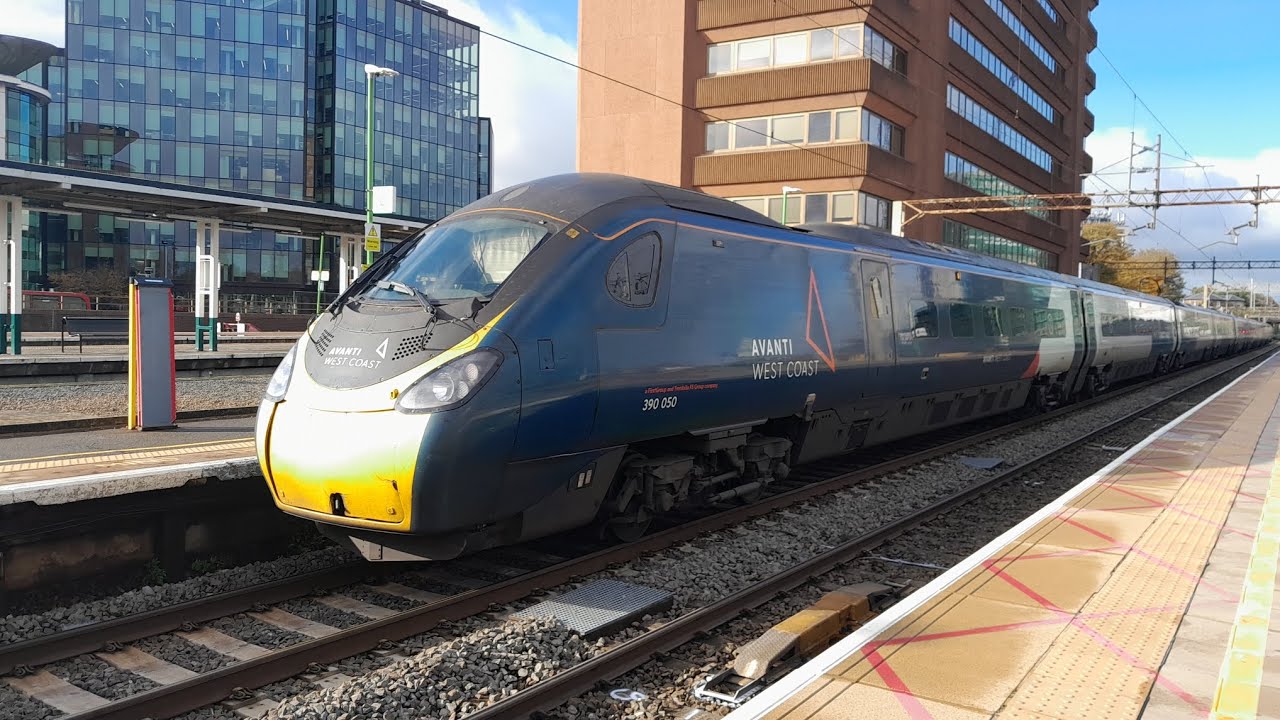 class 390 and class 66 passing through watford Junction - YouTube