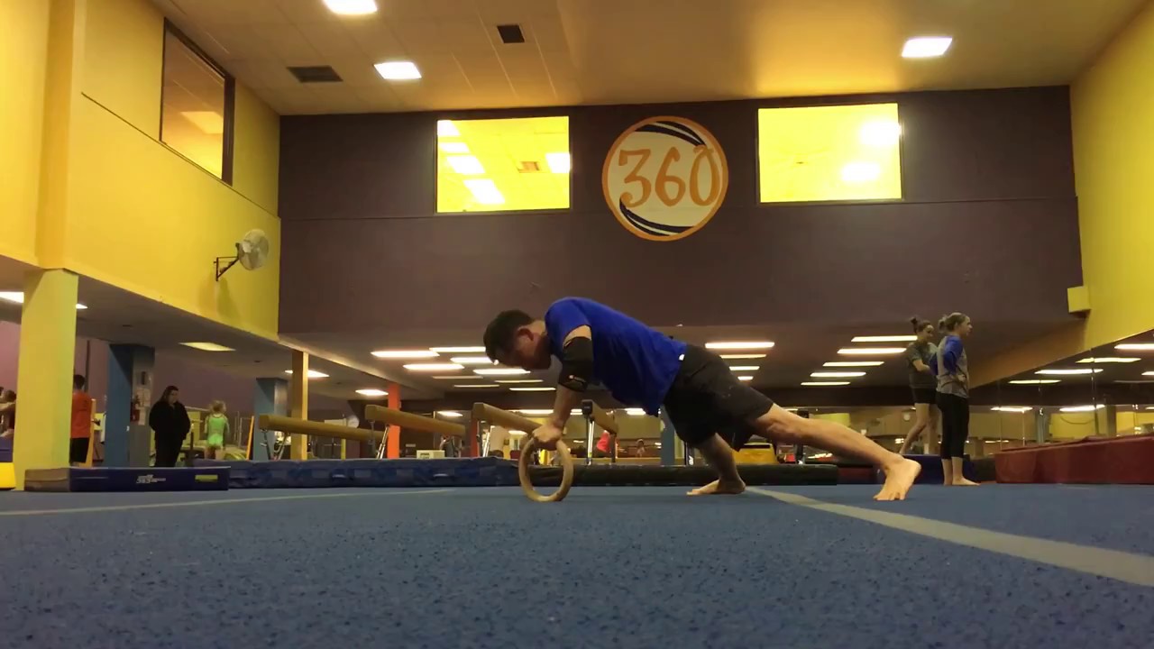 Consecutive single-arm ring-grip push-ups - YouTube