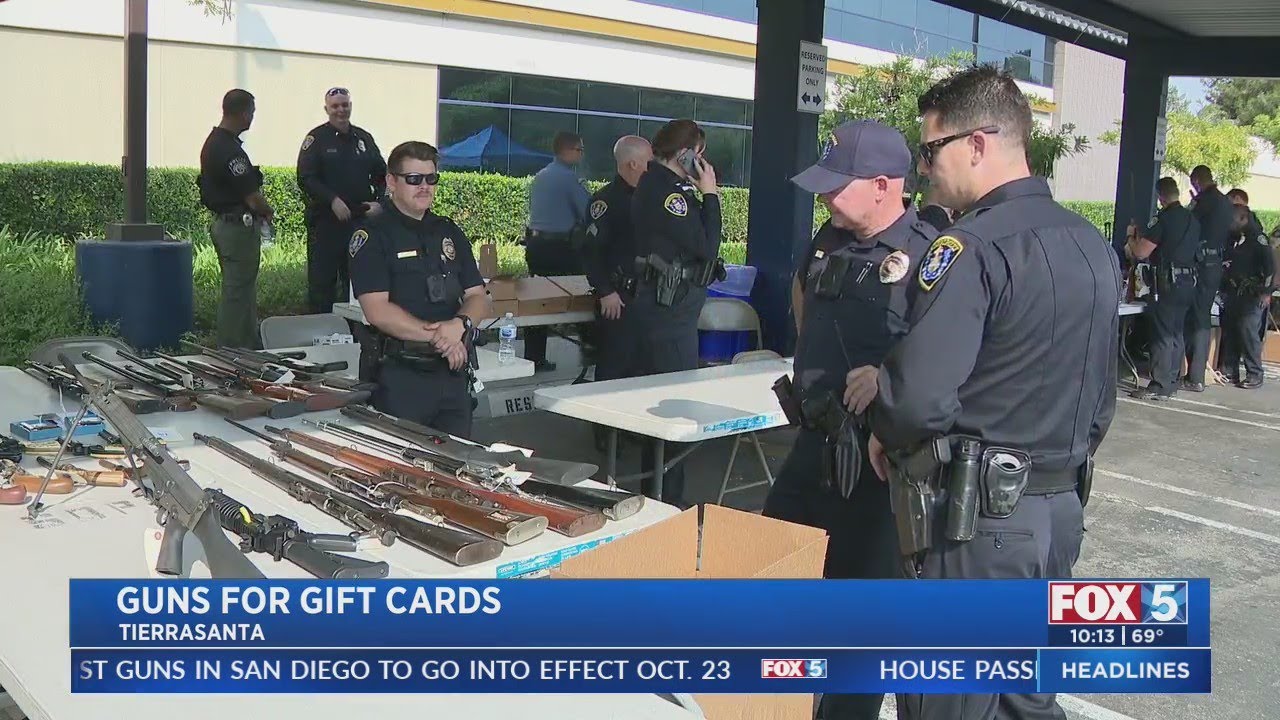Gun Buyback Event Draws Line Of Residents Handing Over Firearms - YouTube