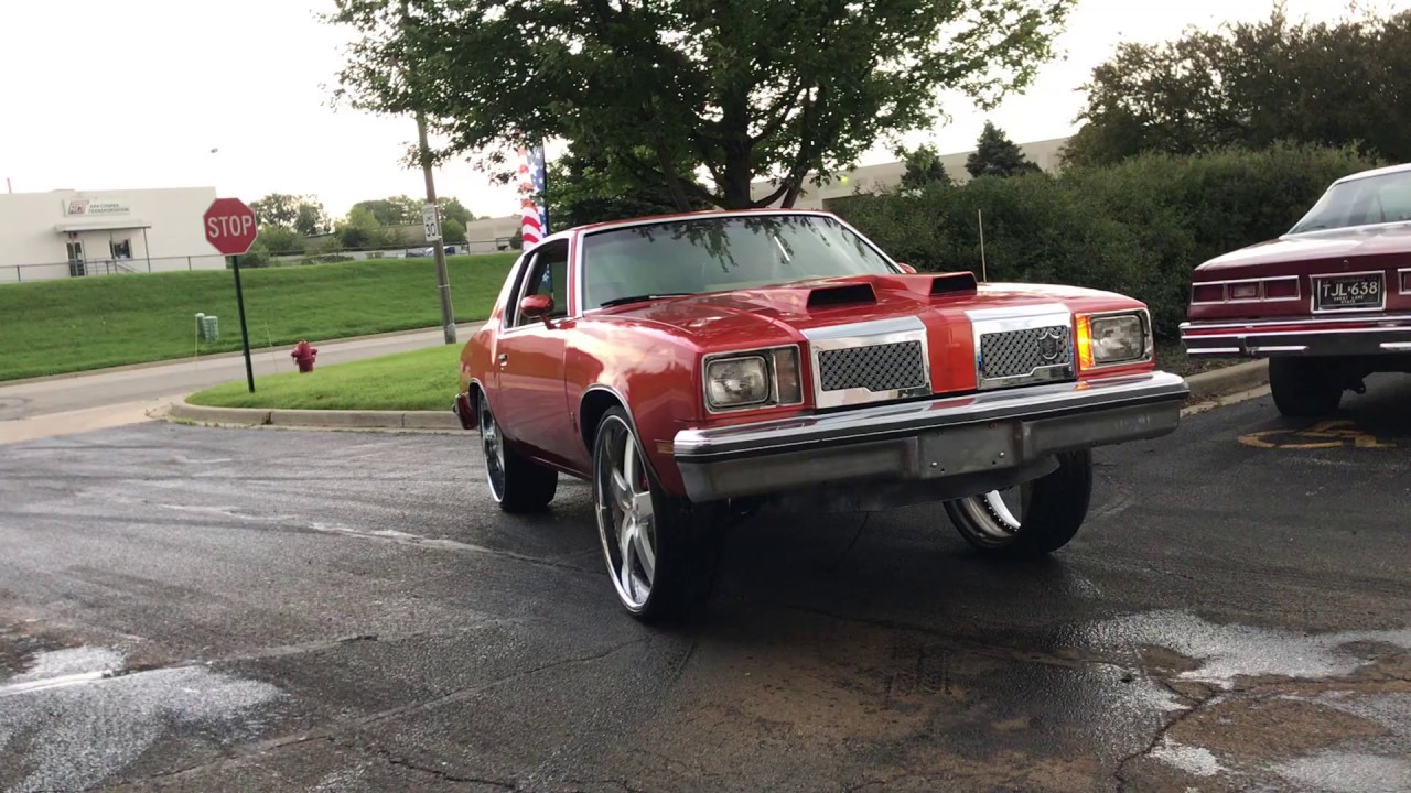 Tuck’d & tubb’d 79 Kandy orange cutlass on 26’s with a 7” lip @ BET IT ...
