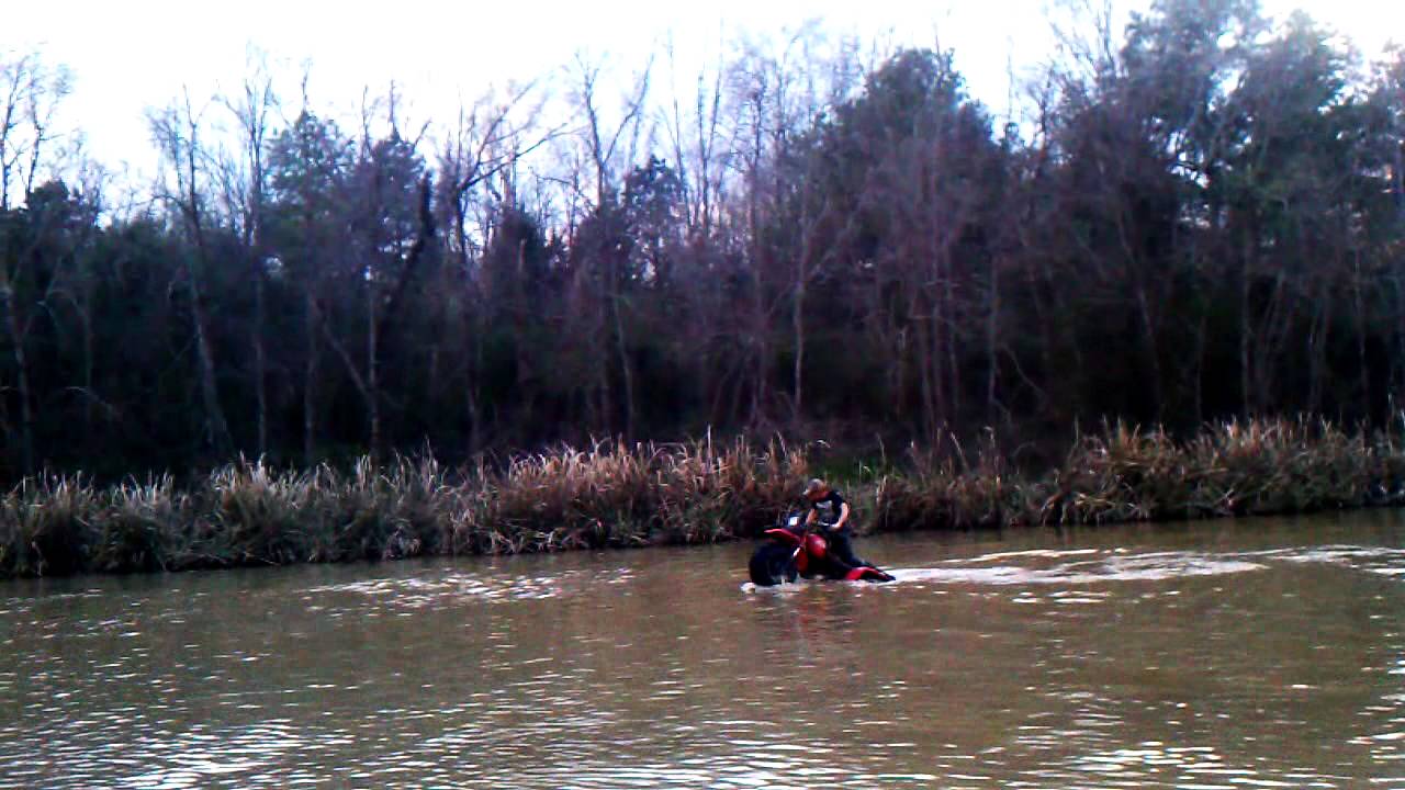 85 Honda big red 250 es floating in the bayou - YouTube