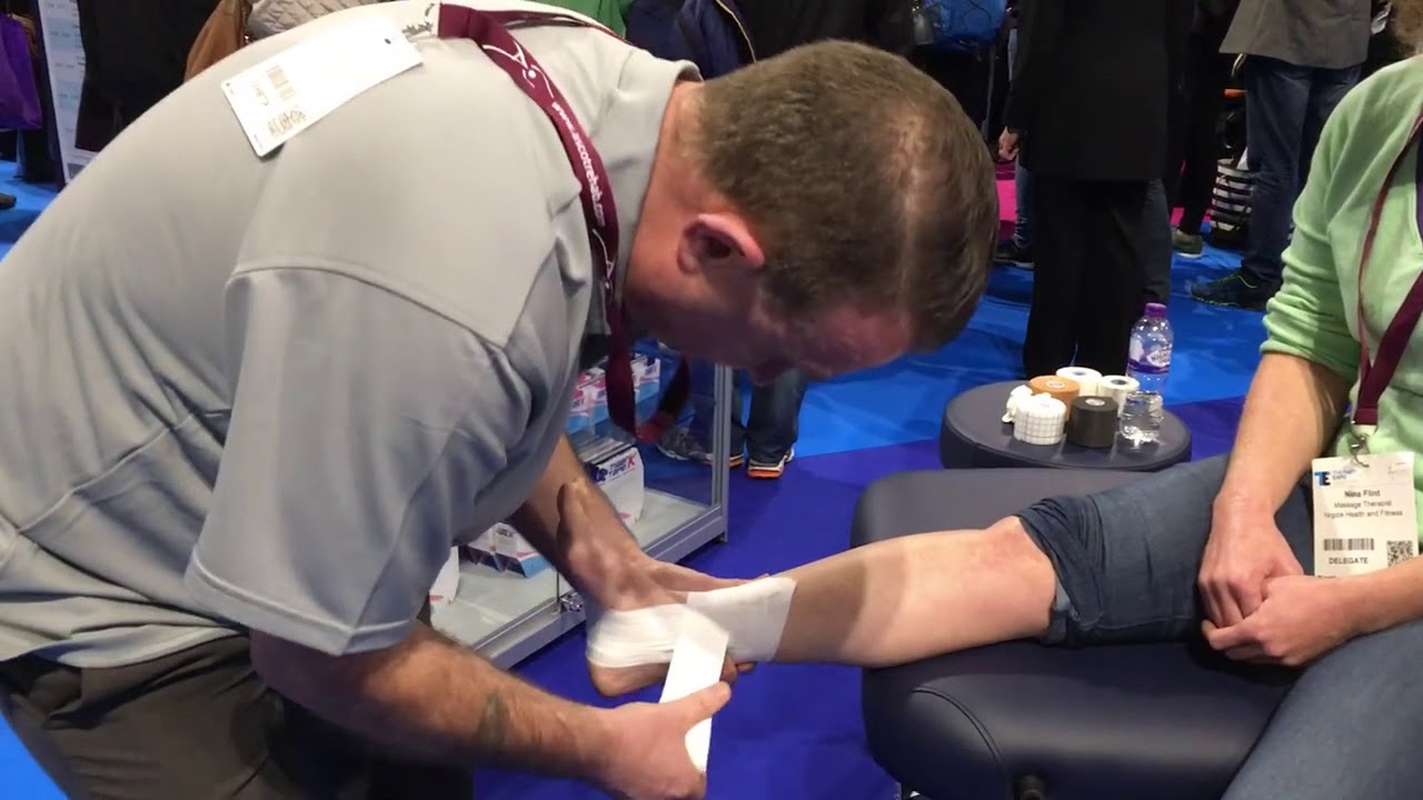 Ankle Taping Technique using Tiger Tape - YouTube