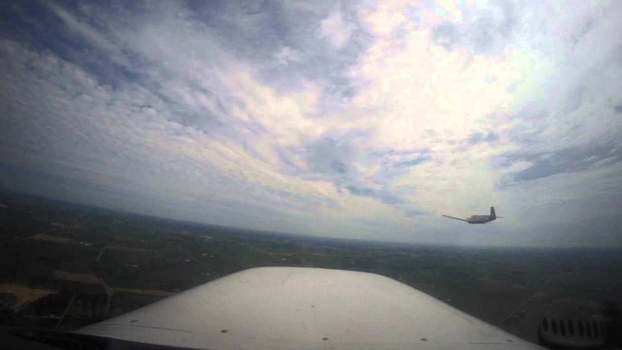 Mooney Caravan formation 2015 EAA AirVenture - YouTube