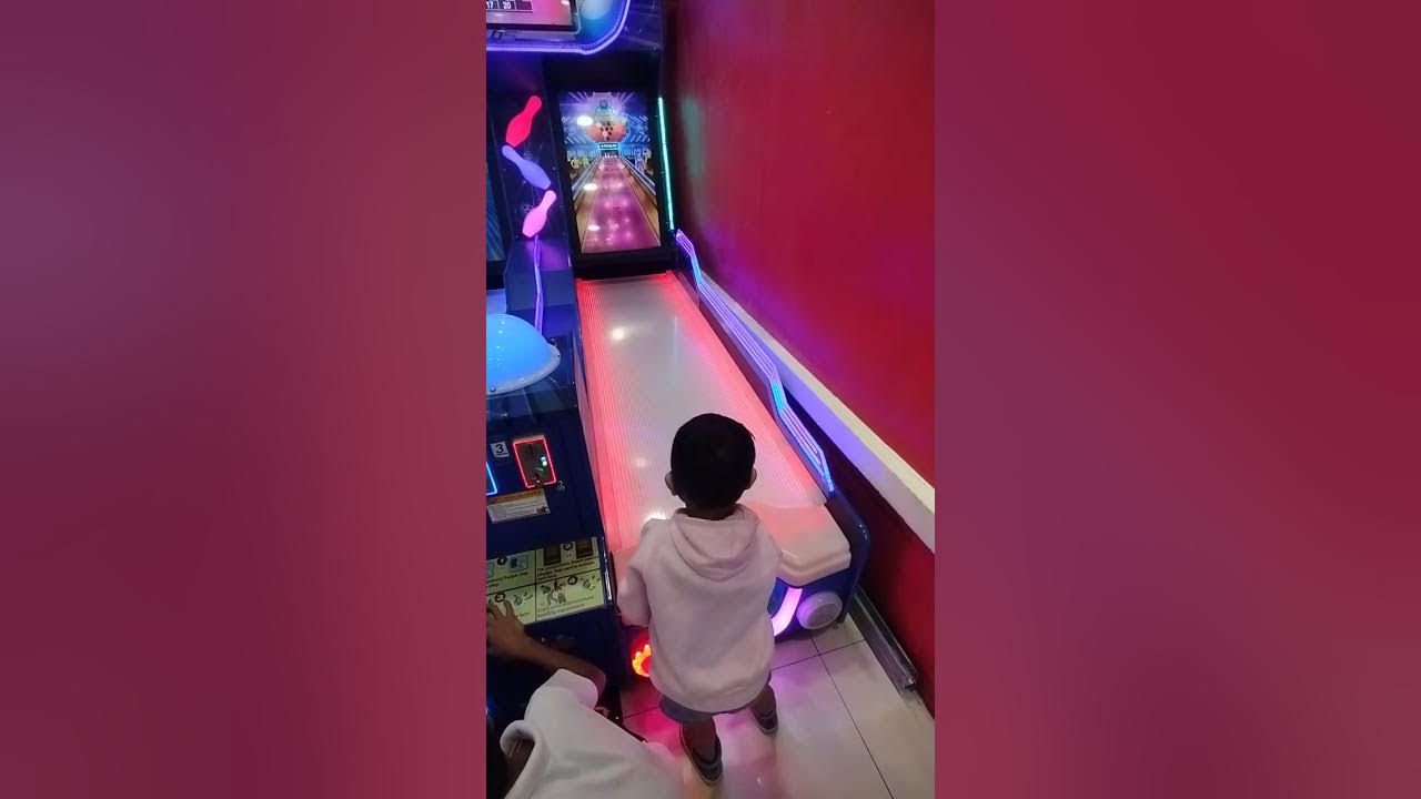 Kid Playing Bowling at WOF - YouTube