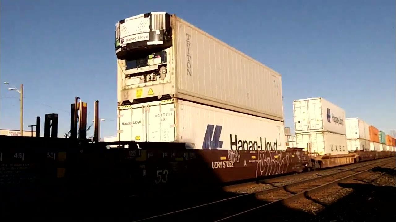 CN 123 w/CN Engines 3132 (ex GECX 2043) & 2981 lead this long 428 axle, WB Intermodal/Autorack ...
