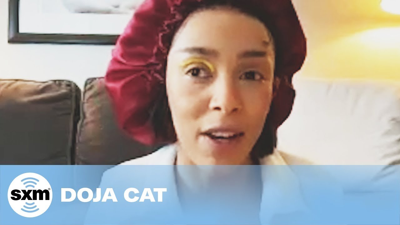 Doja Cat Explains "Kiss Me More" Music Video Meaning | SiriusXM - YouTube