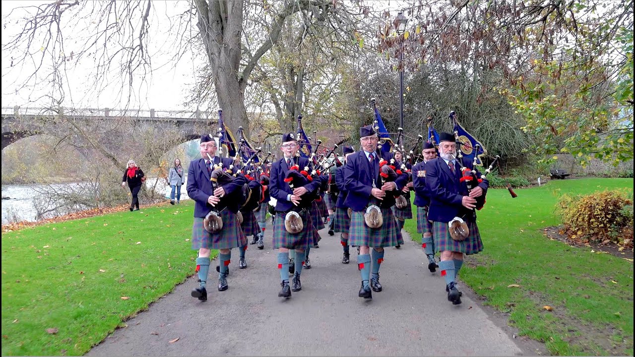Perth Pipe Band lead 2024 Remembrance Sunday parade along river Tay to ...