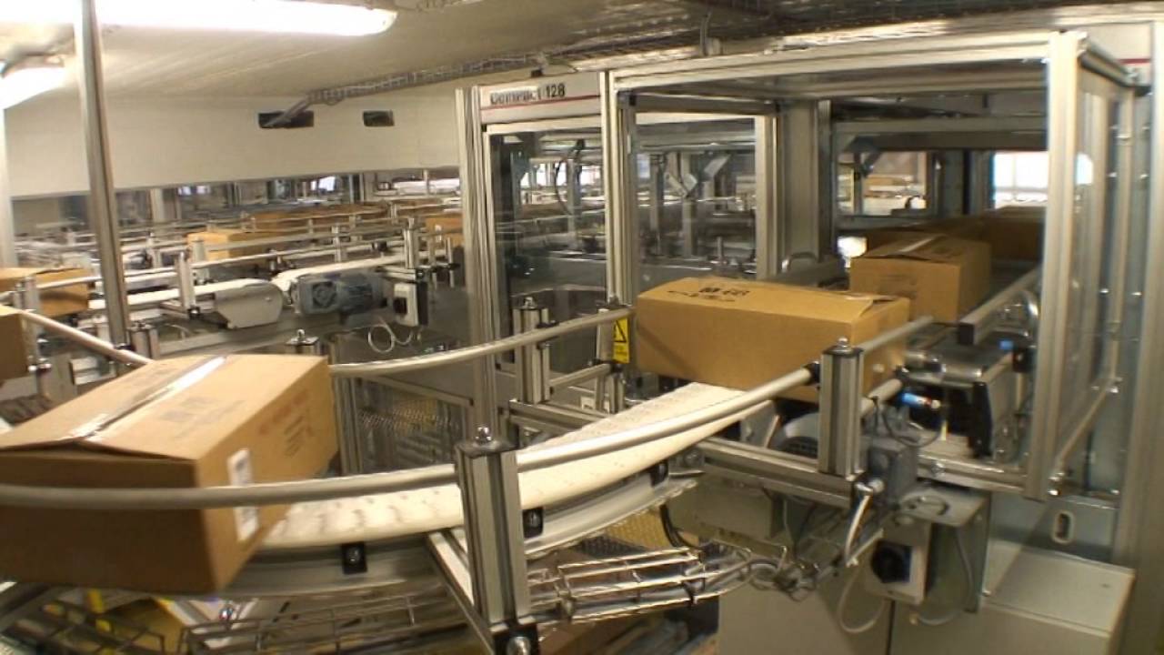 Carryline InterSystem - Case Handling Conveyor - YouTube