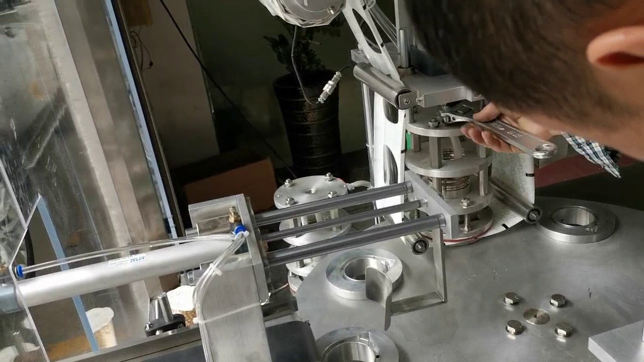 How to change over cup sizes for cup filling machine - YouTube