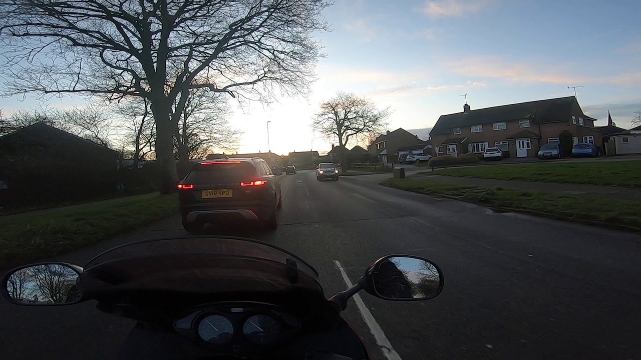 Driver pulling out of side road - YouTube