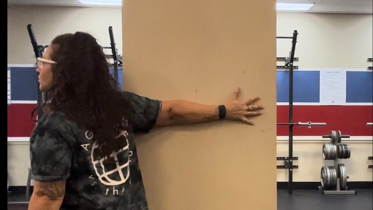 Standing wall bicep stretch - YouTube
