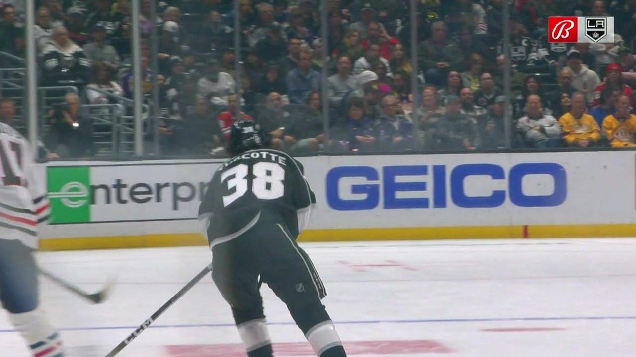 Alex Turcotte hurts his shoulder after taking a hit from Taylor Raddysh ...