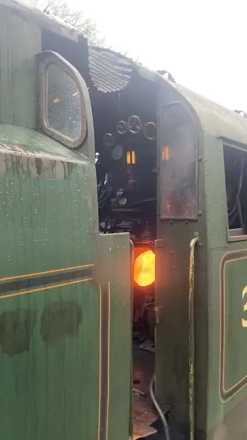 Manston’s warming fire on a cold and wet day with close ups of ...