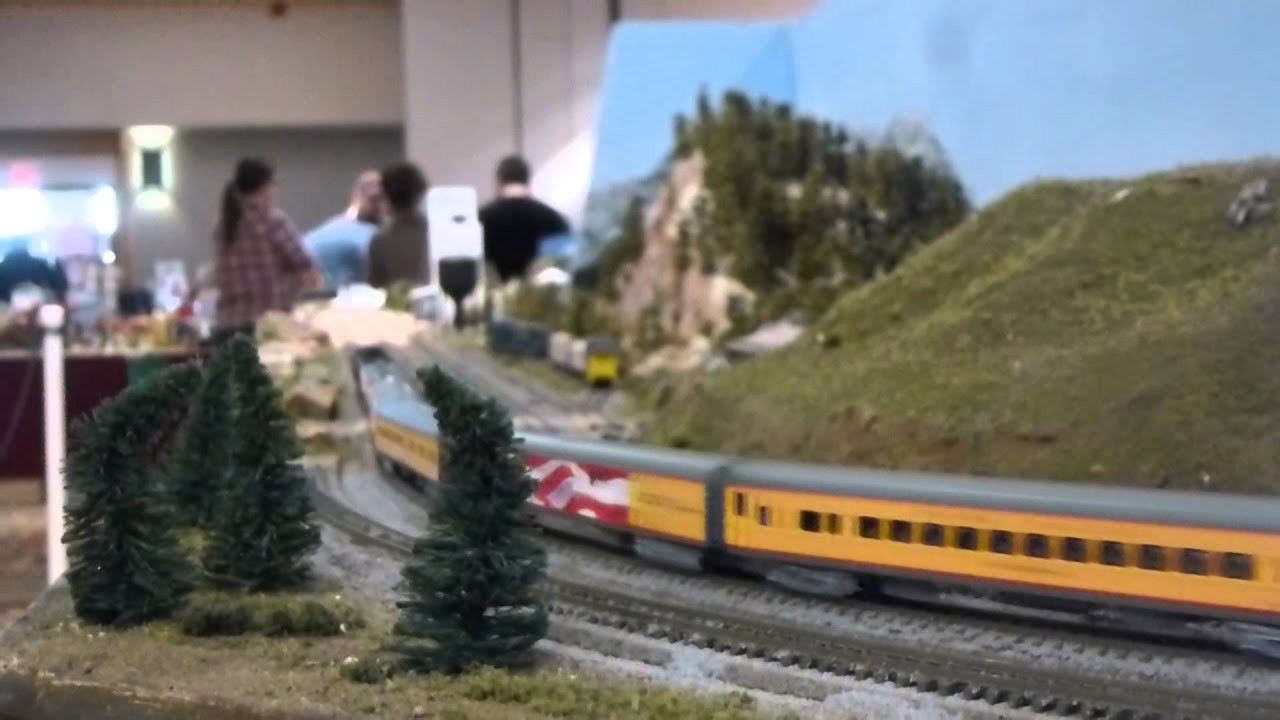 N Scale, Union Pacific 844 Leads a Passenger Train Around a Curve - YouTube
