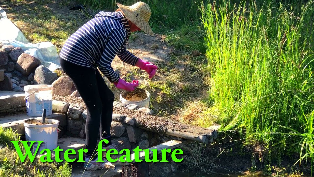 How to build a stream from stones in backyard - YouTube