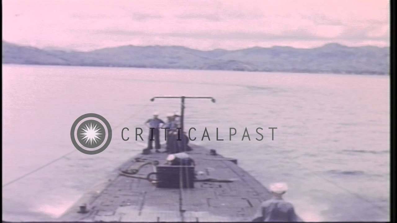 US sailors aboard USS Bluegill SS-242 off the coast of Saipan, fire ...