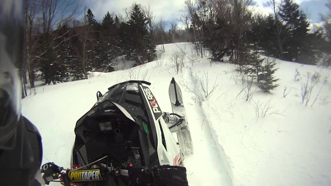 Bunch of sleds hillclimbing in deep snow - YouTube