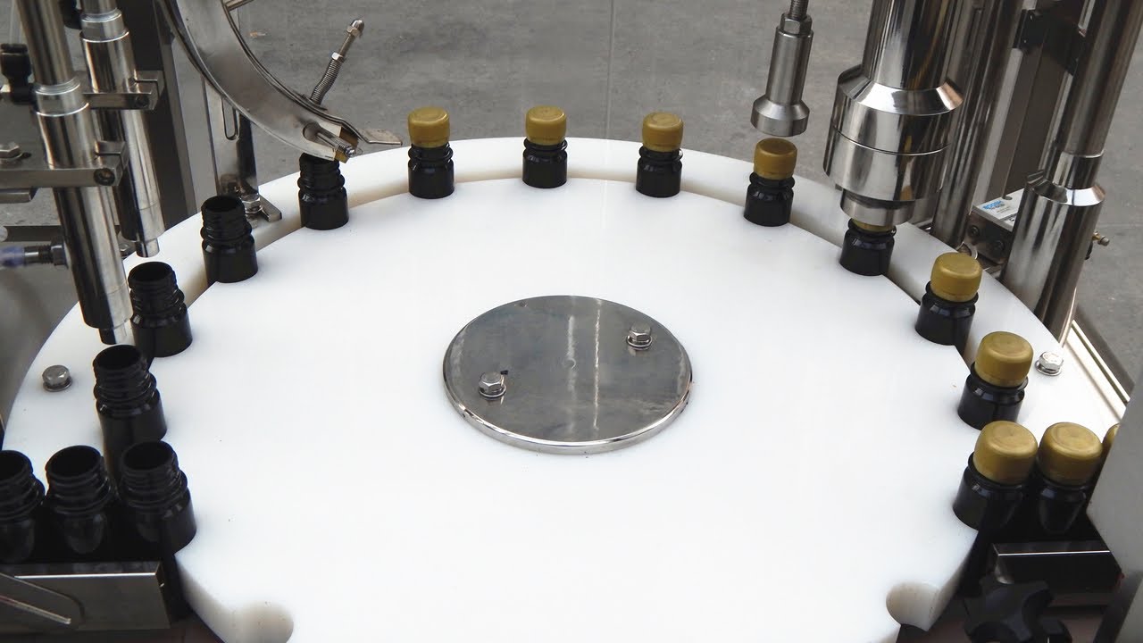 Drip-proof automatic liquid filling and capping machine for small ...