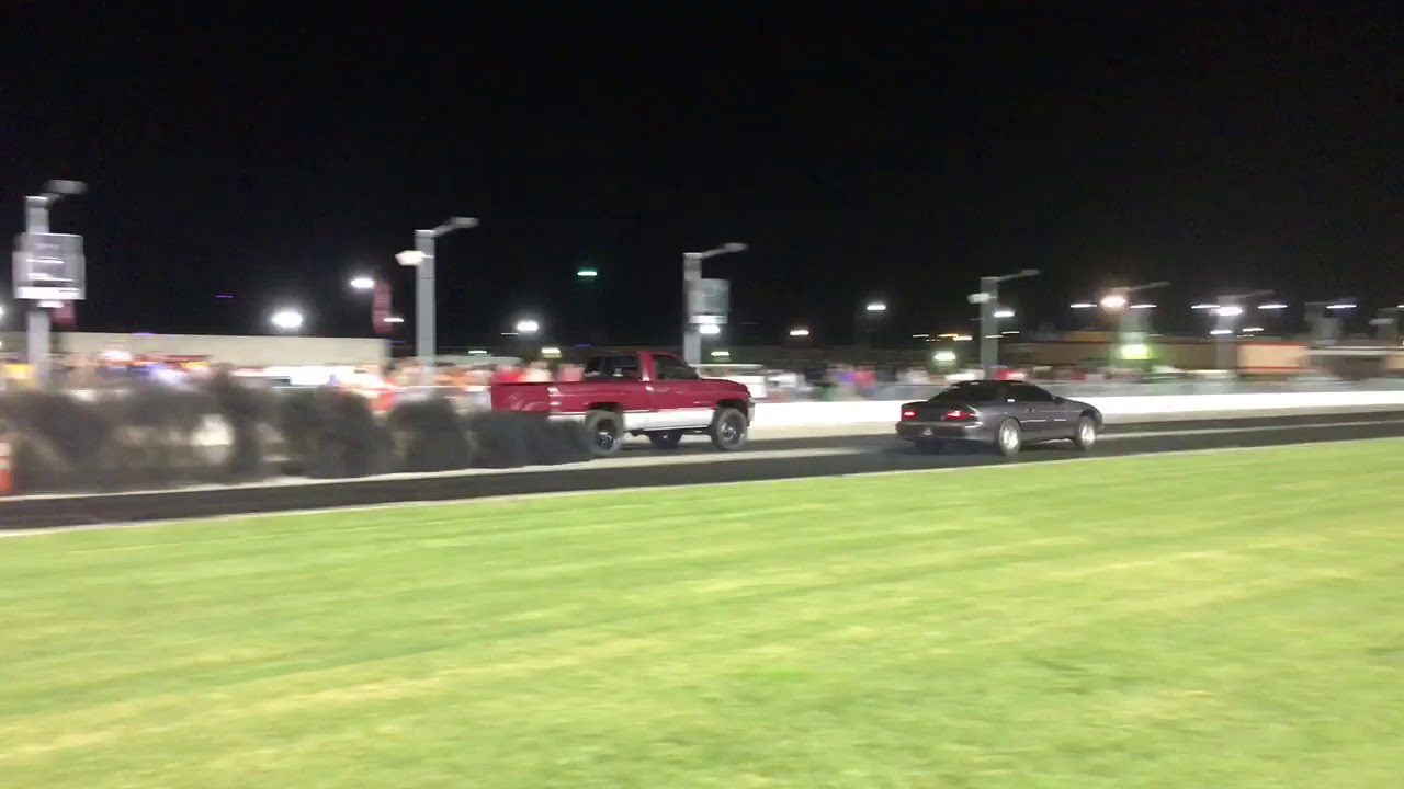 Friday night drags camaro vs Cummins - YouTube