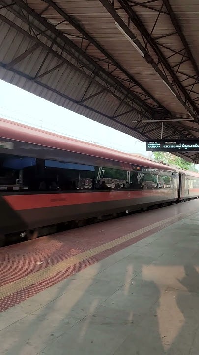red indian bullet train vande bharat crossing the station in his full speed short vlogging - YouTube