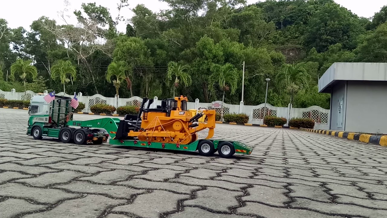 Scania v8 with lowboy carrying dozer - YouTube