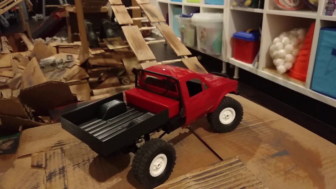 Upgraded 1/16 WPL C14 on cardboard crawler course 1 - YouTube