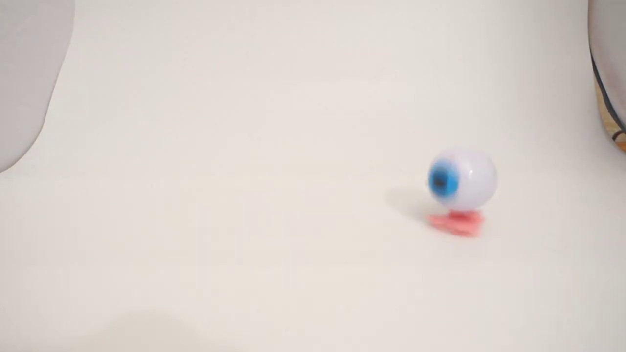 Wind-up jumping eye toy testing - YouTube