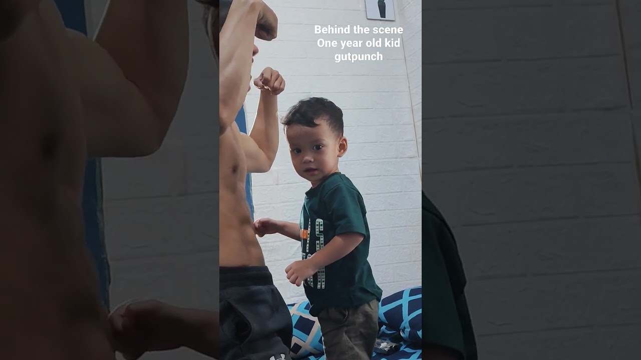 behind the scene one year old son gutpunching dad - YouTube