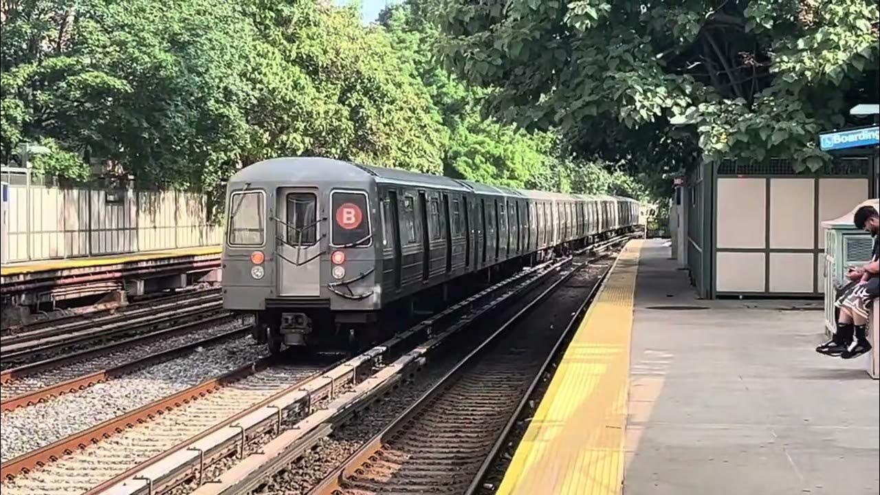 Manhattan bound R46 (Q) train at Avenue H, with an R68/R68A (B) express trains bypassing the ...
