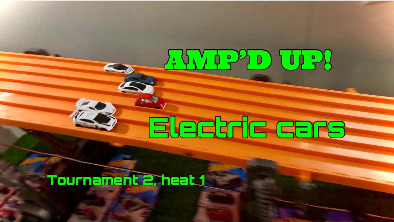 Racing electric cars with new electronic starting/finish gate and timer ...