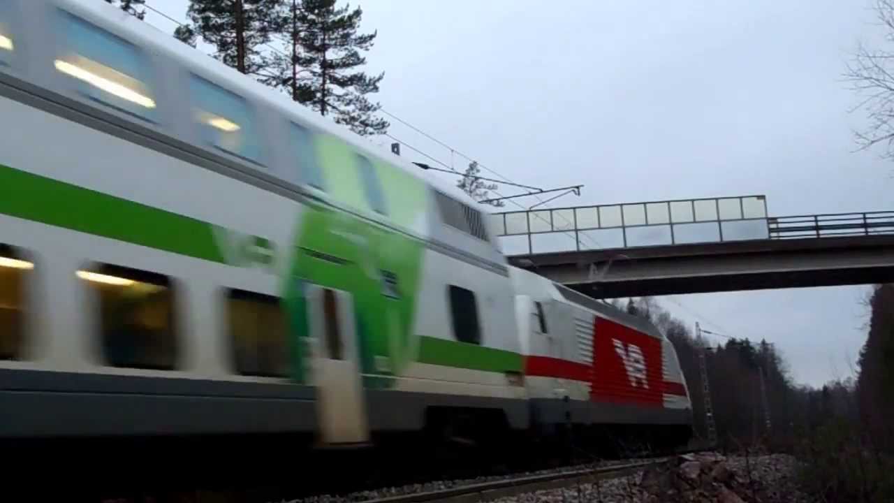 Finnish InterCity2 trains 955 and 960 passes kilometre post nr. 82 ...