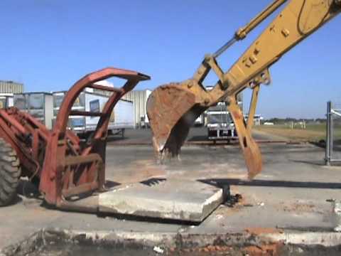 Taylor loader moving concrete - YouTube