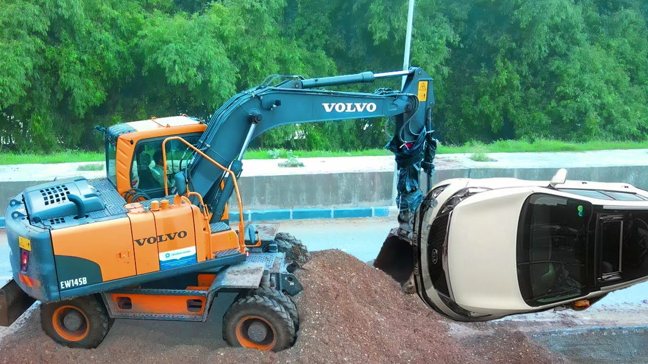 VOLVO EW145B Excavator Loading And Transporting Soil - Sotiriadis ...