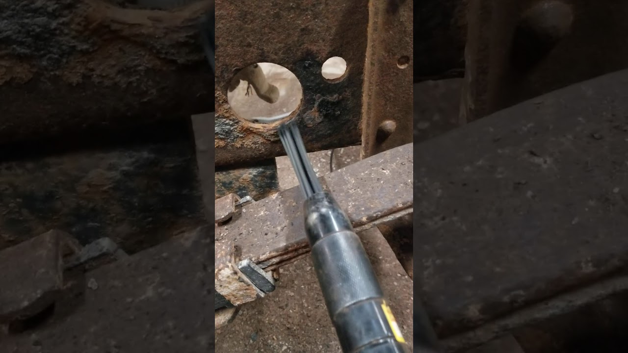 Using needle scaler to clean frame. - YouTube