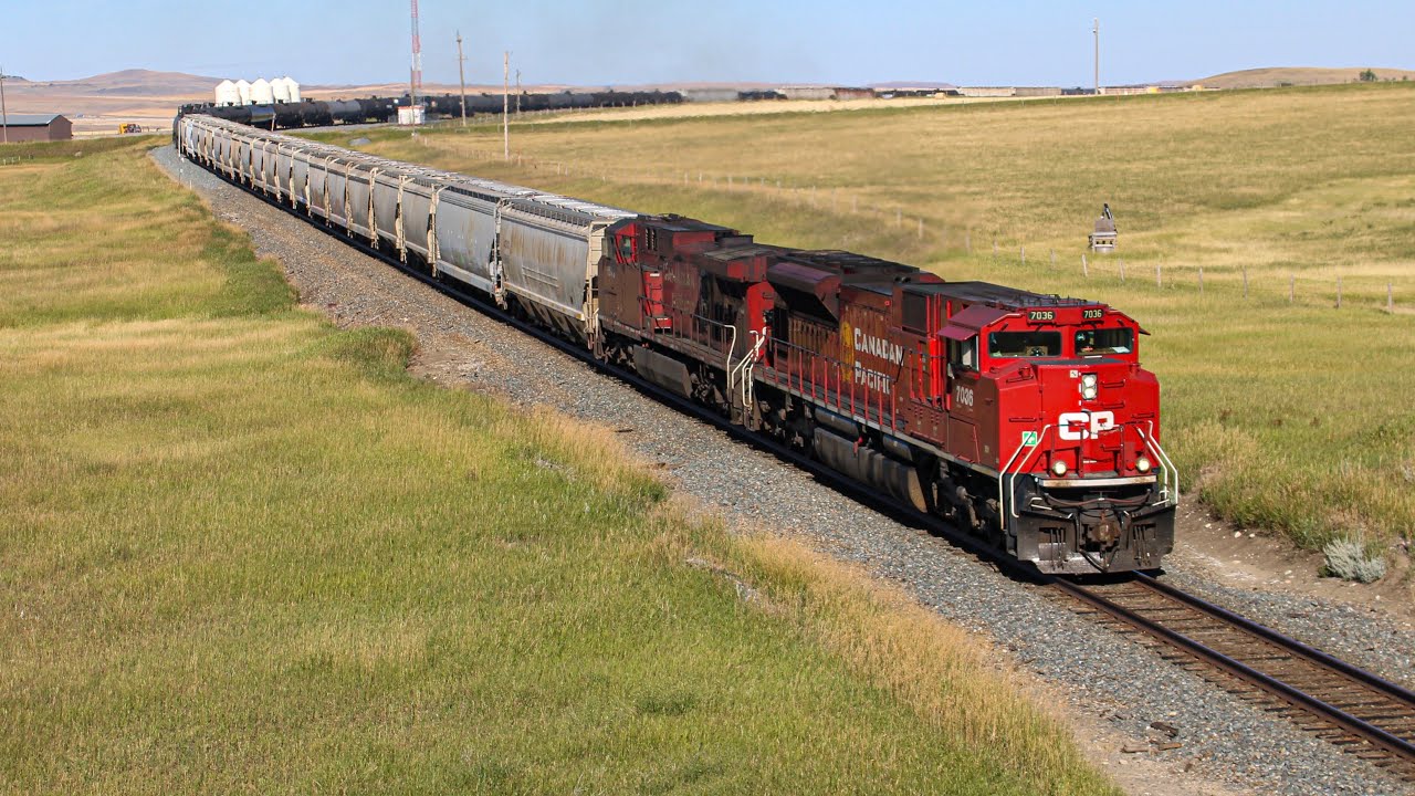 HUGE TRAIN w/ACu Leader!!! CP 7036, CP 8549 and UP 6684 lead CP 419 West on the CP Crowsnest Sub ...