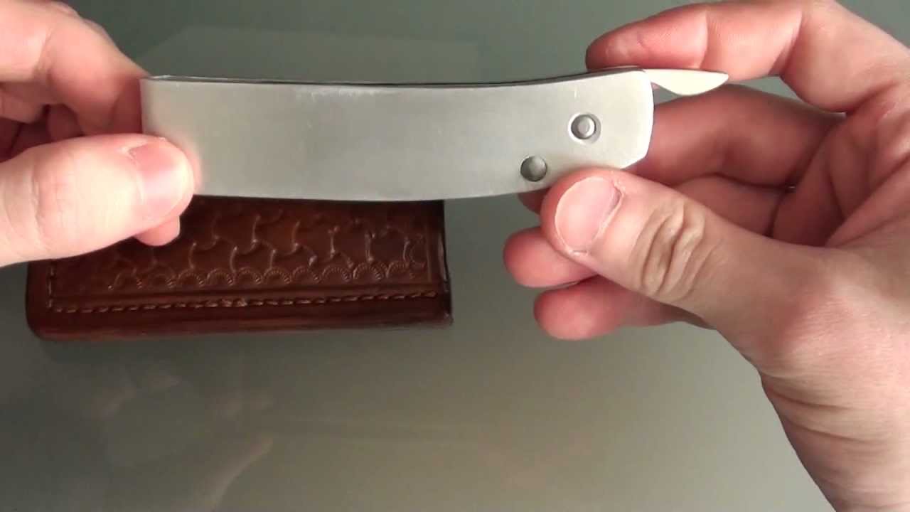 First finished knife, friction folder - YouTube