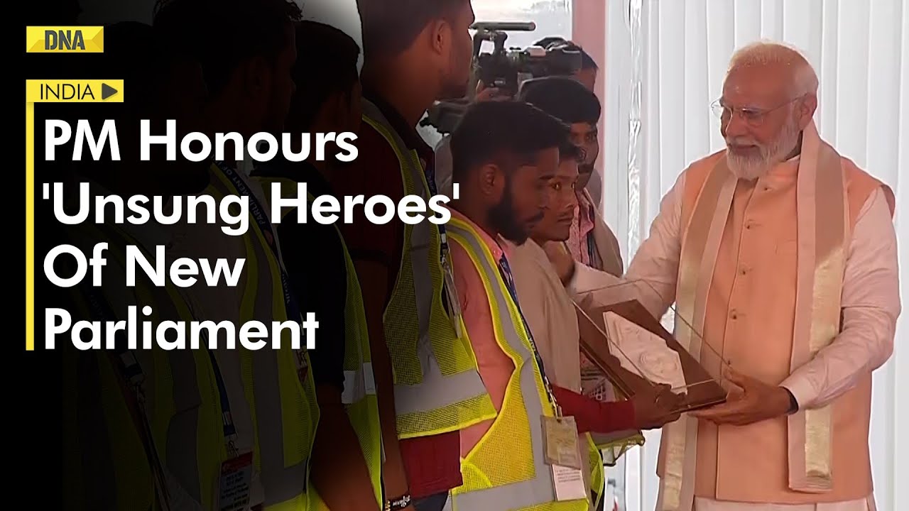 PM Modi felicitates workers who helped in building new Parliament ...