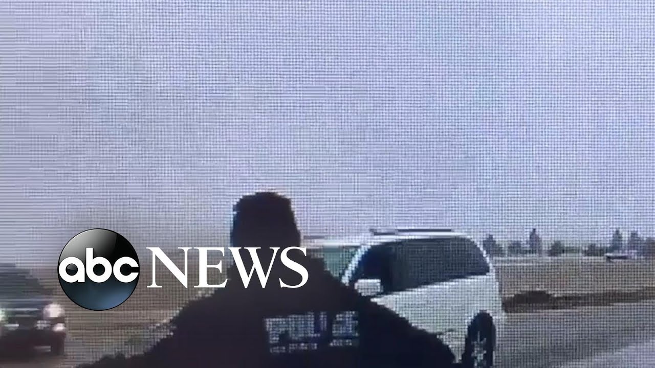 Vehicle loses control, almost hits police officer l ABC News - YouTube