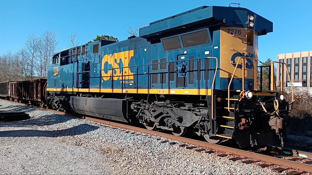 CSXT 7276 leads CSX MOW train into Columbia SC on the CSX CN&L Subdivision with SCL box car ...
