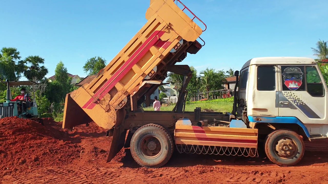 Bulldozer loading truck | Dump trucks working | Dump truck, Mobil truck ...
