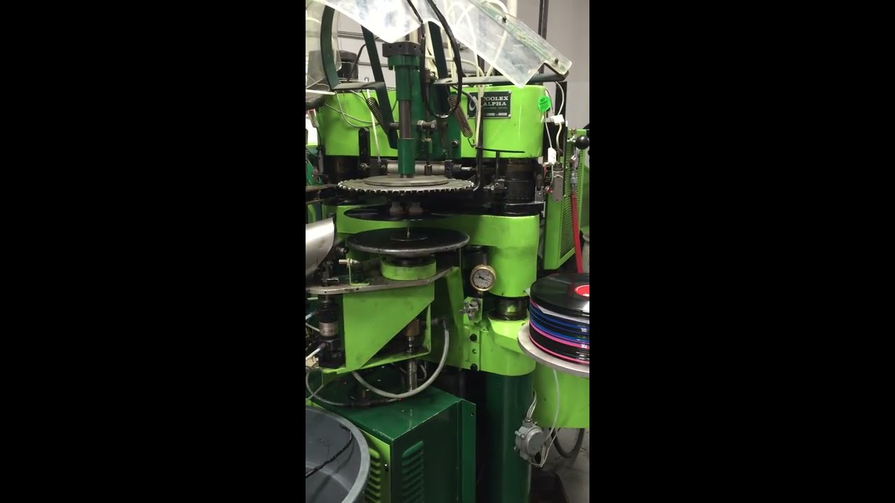 Toolex Alpha Record Press - YouTube