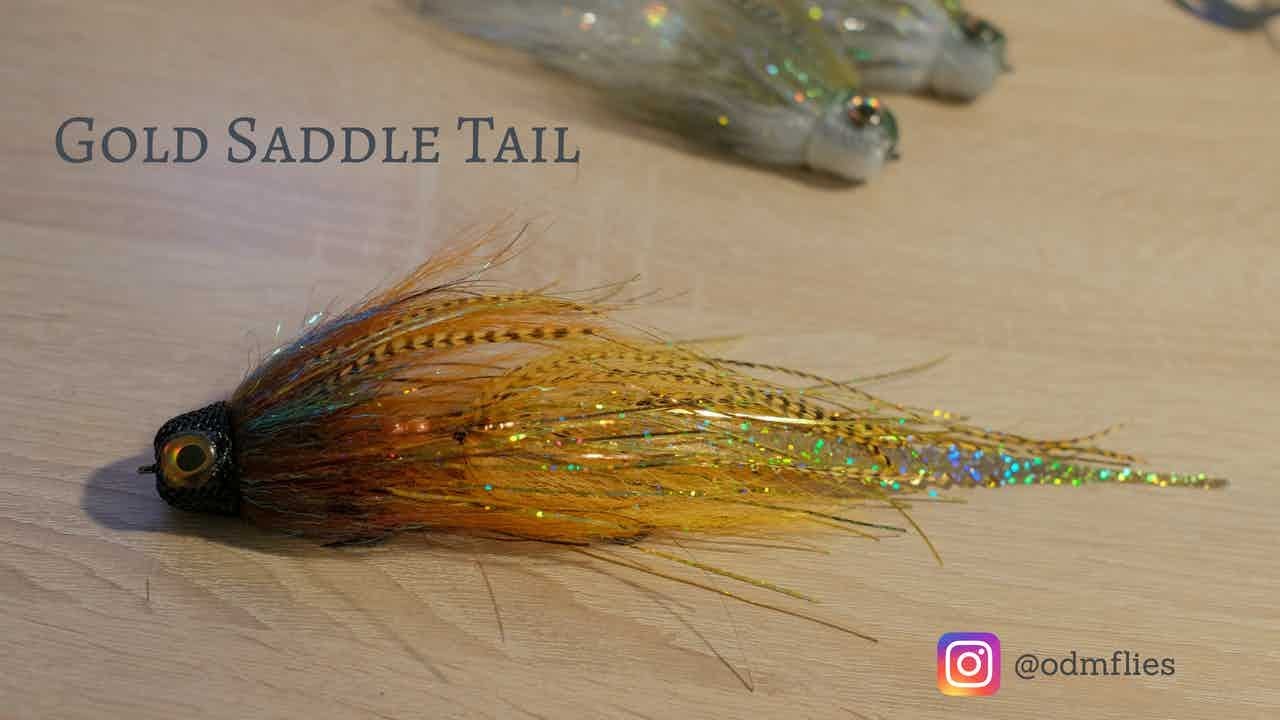 Fly tying: GOLD Saddle Tail articulated musky & pike fly - YouTube