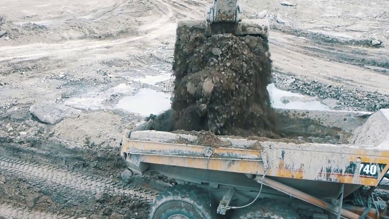 Heaping buckets and loading trucks...part 2 - YouTube