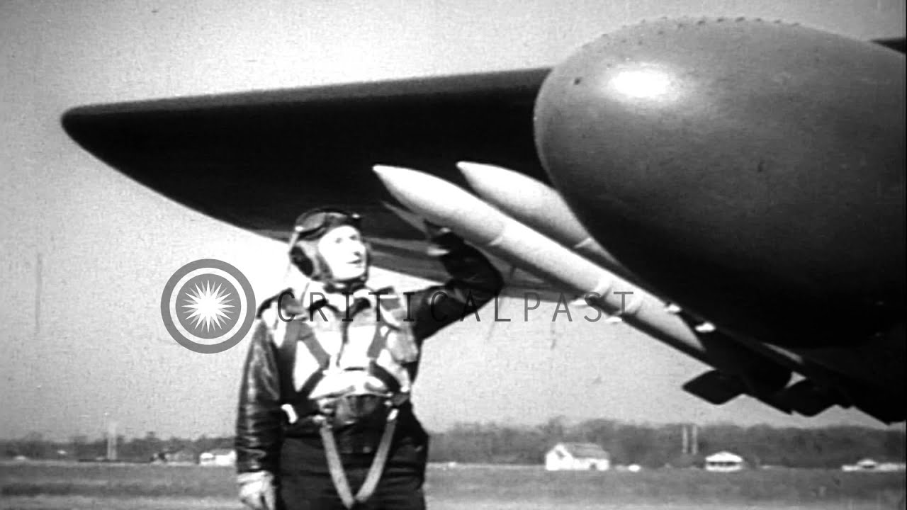 Martin AM Mauler aircraft with mounted bombs and rockets under the wing ...