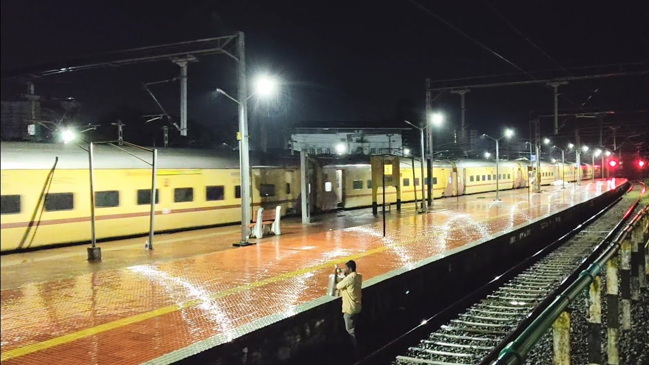 Malabar Express in Rain arriving Kottayam railway station - YouTube