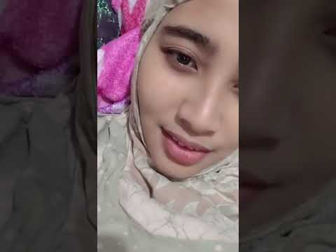Auntie's hijab plays with her tongue