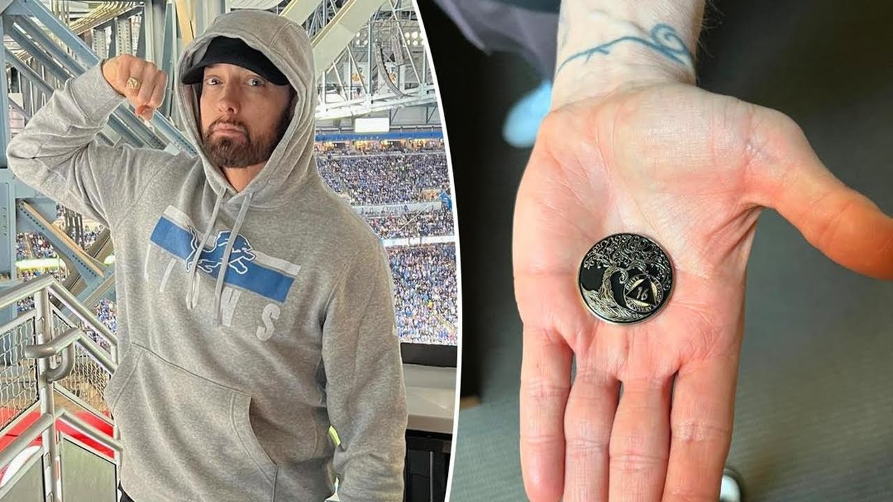 Eminem flaunts his new chip to commemorate 16 years sober. - YouTube
